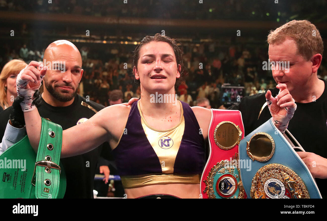 Katie Taylor (centre) celebrates her win against Delfine Persoon in the ...