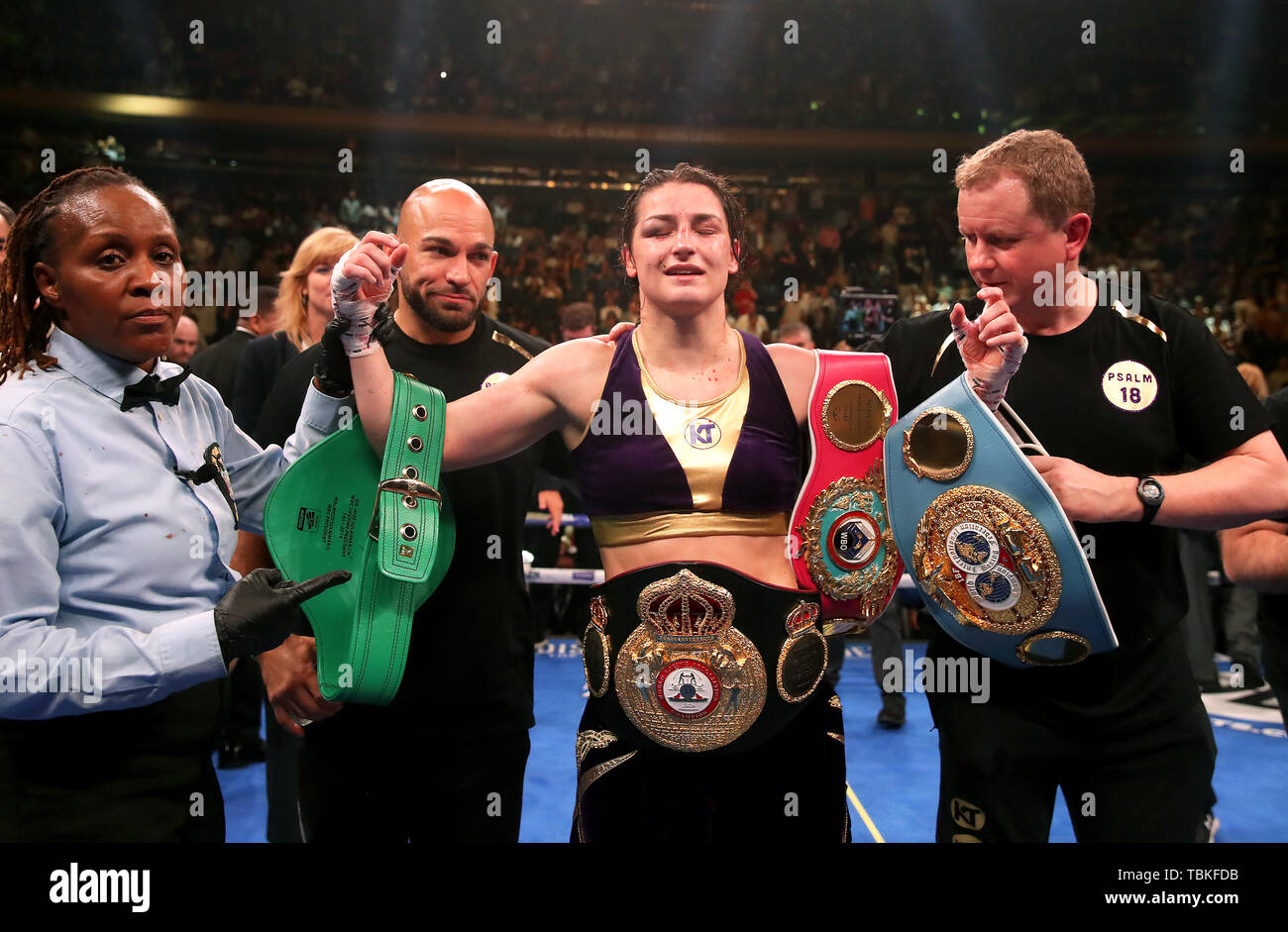 Katie Taylor (centre) celebrates her win against Delfine Persoon in the ...