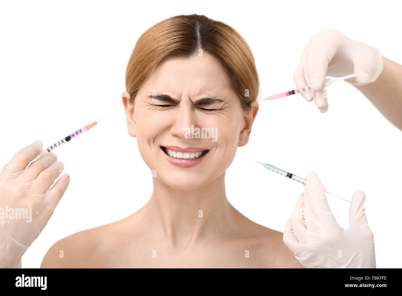 Scared Woman And Hands Holding Syringes For Anti Aging Injections On