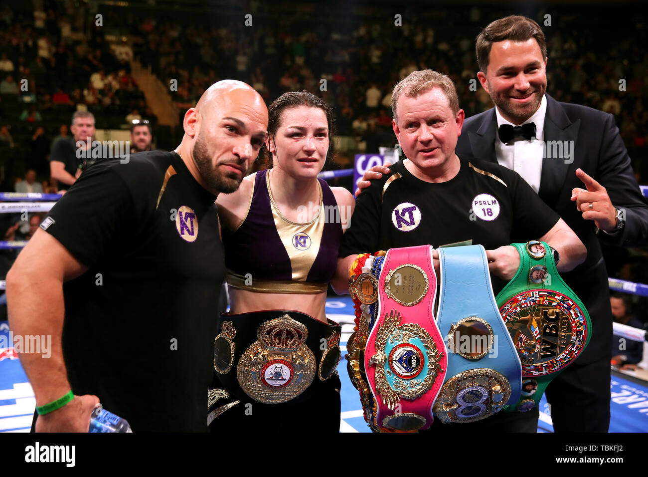 Katie Taylor (centre) celebrates her win against Delfine Persoon in the ...