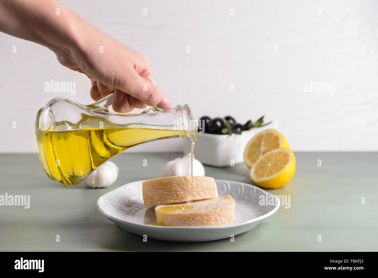 Pouring oil onto recipe hi-res stock photography and images - Alamy