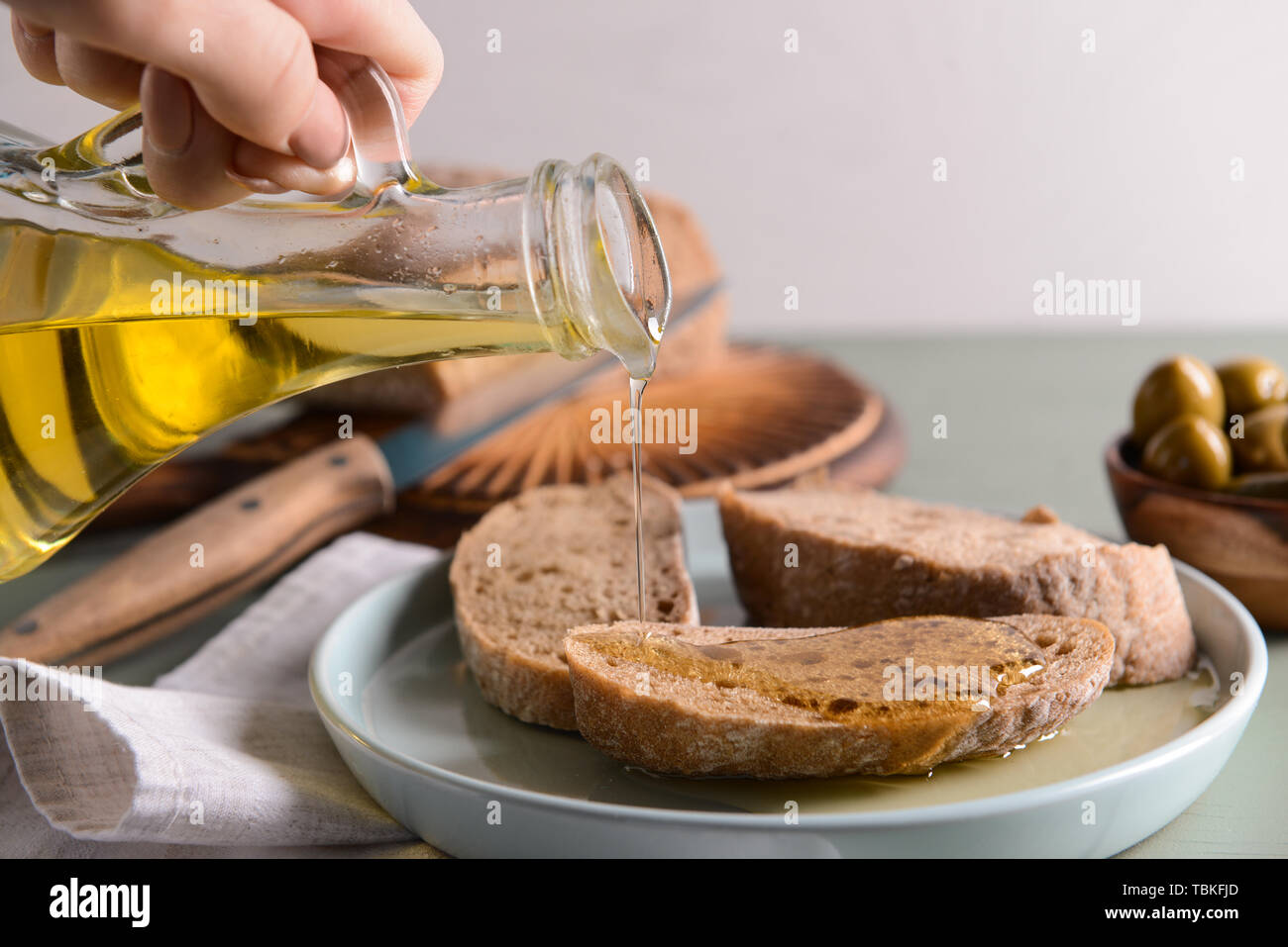 Pouring oil from jug bottle hi-res stock photography and images - Alamy