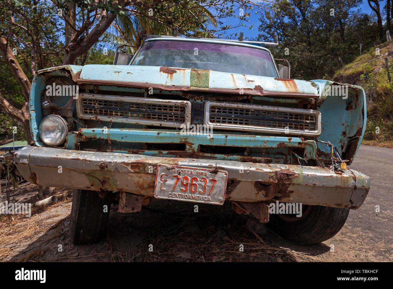 Front, radiator grill of an old rusty car, near Liberia, Guanacaste ...