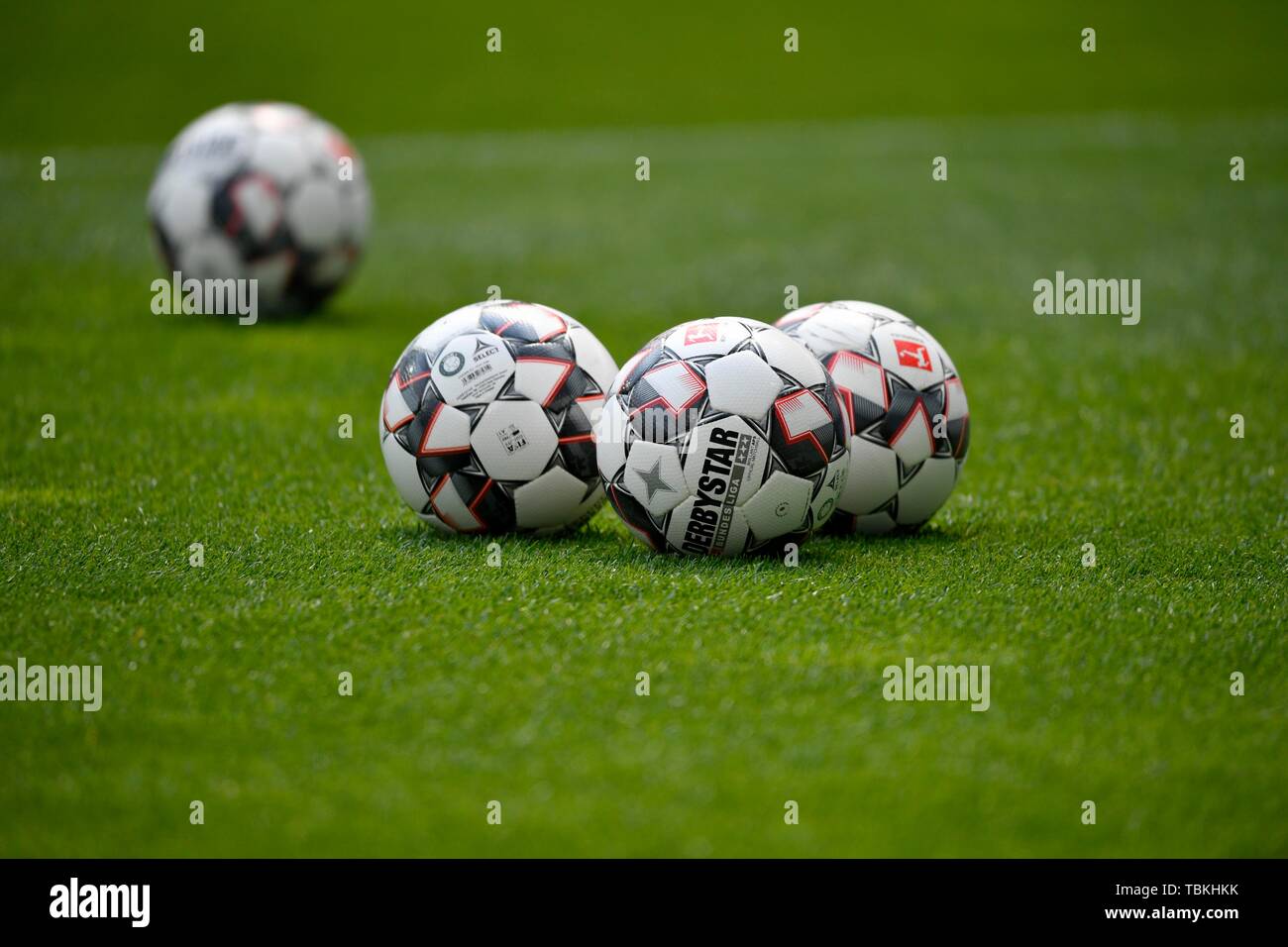 Four match balls adidas derbystar hi-res stock photography and images ...