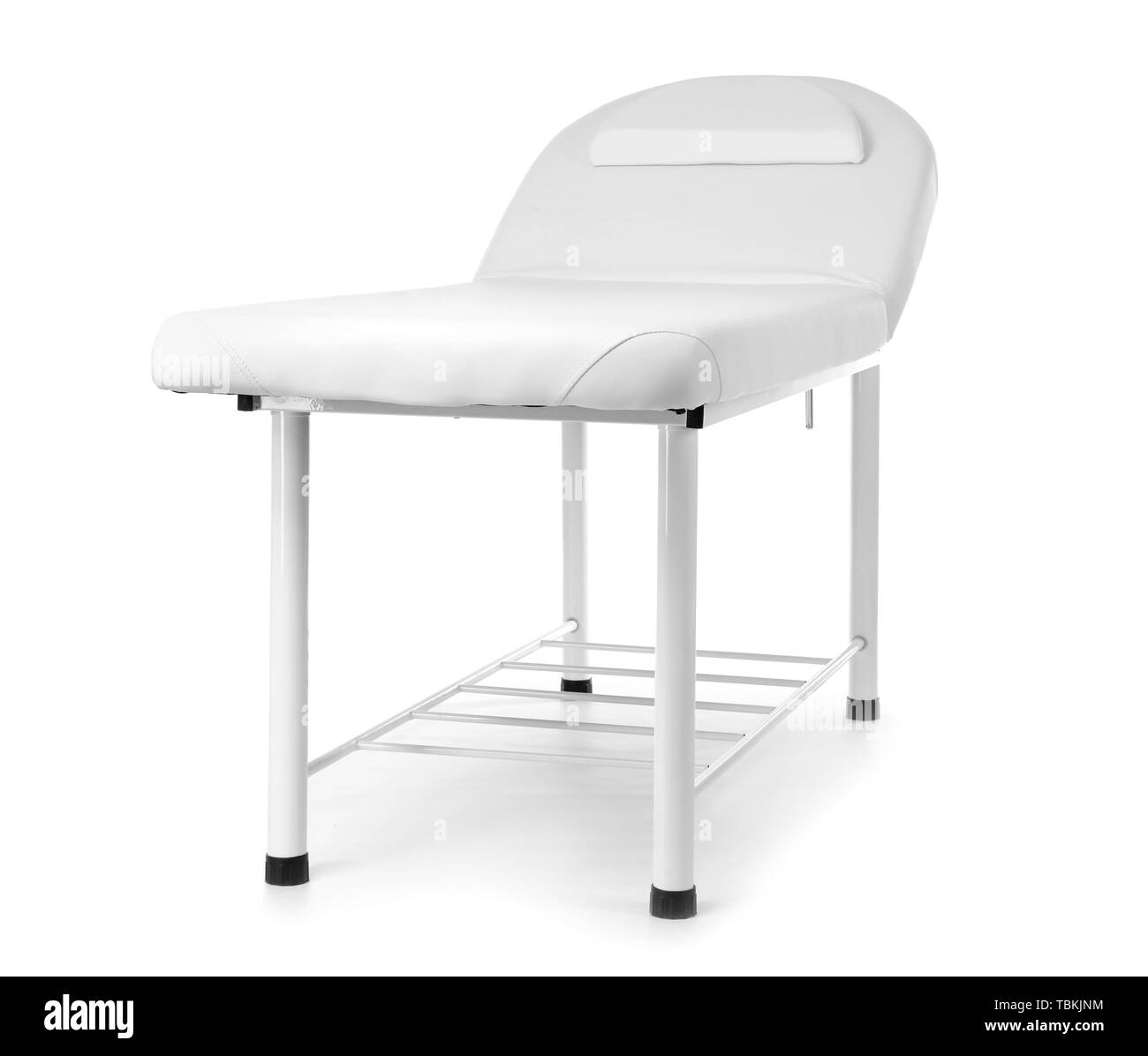 Treatment couch on white background Stock Photo - Alamy