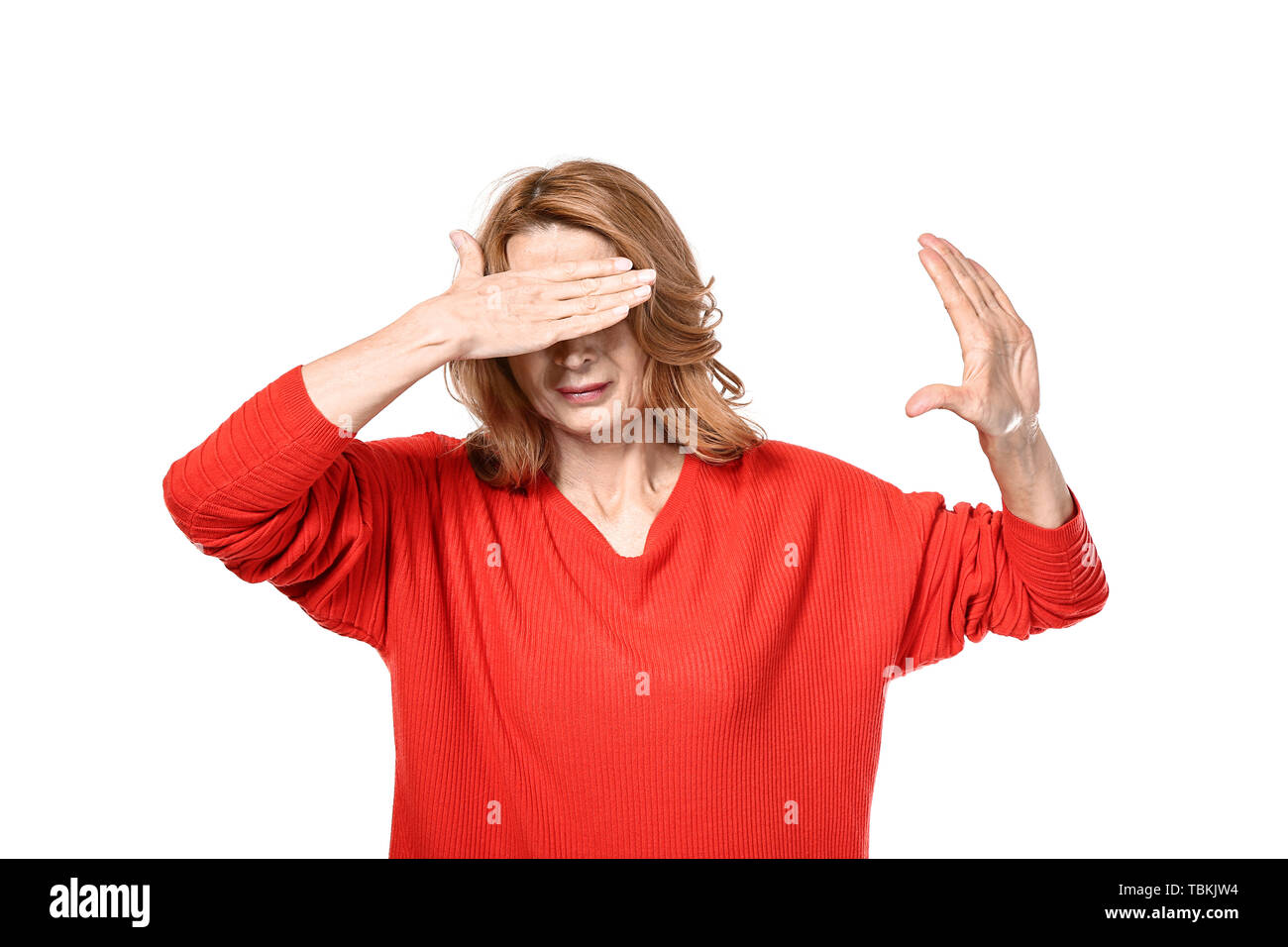 Offended mature woman on white background Stock Photo - Alamy