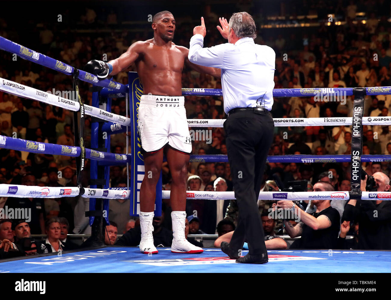 Referee Mike Griffin (right) counts Anthony Joshua down at Madison ...