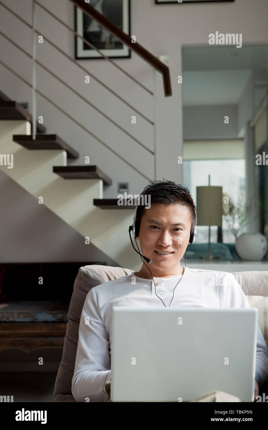A man surfing the Internet Stock Photo - Alamy