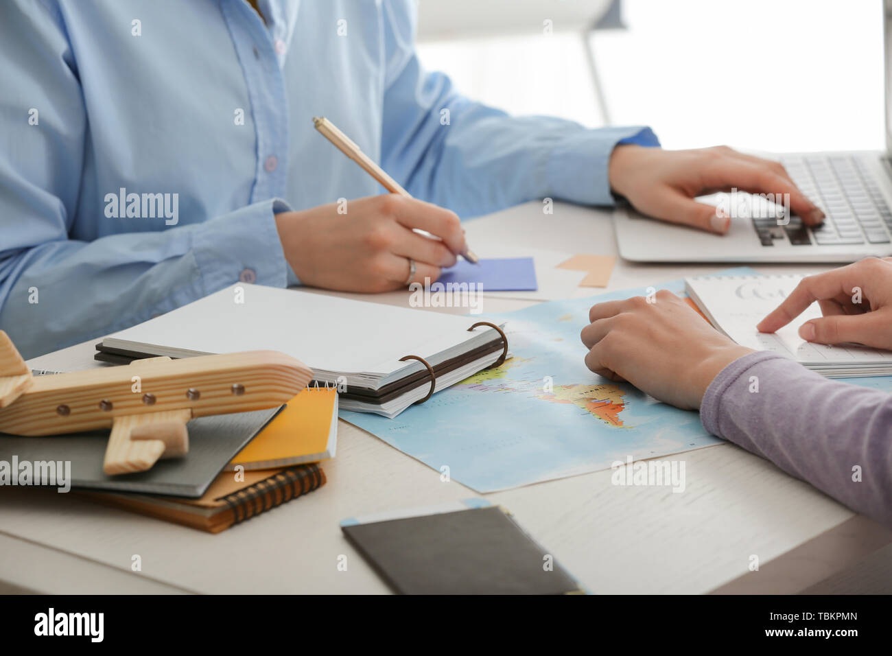 Business people discussing world map hi-res stock photography and ...