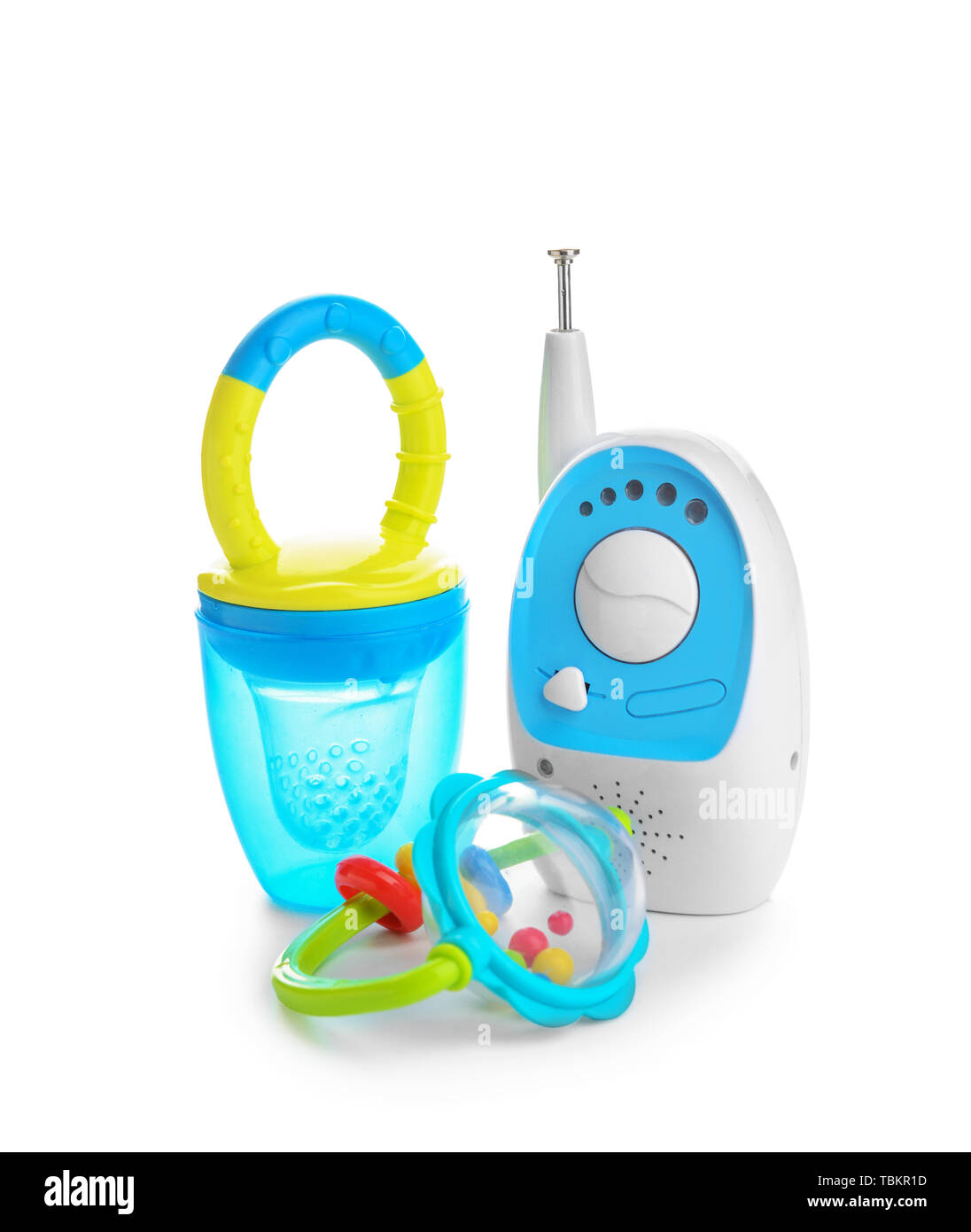 Modern baby monitor with feeder and toy on white background Stock Photo ...