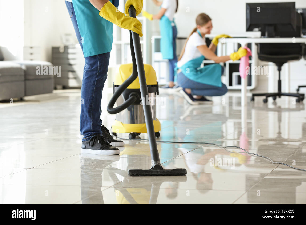 Cleaner office hoovering hi-res stock photography and images - Alamy
