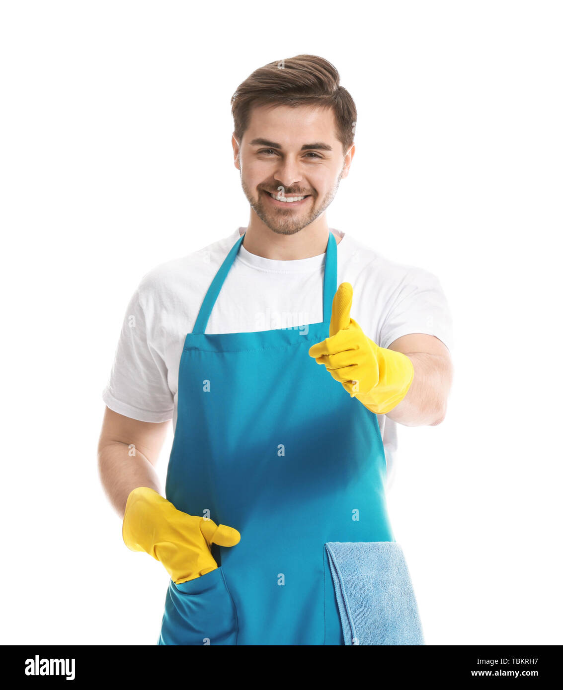 Male janitor showing thumb-up on white background Stock Photo - Alamy