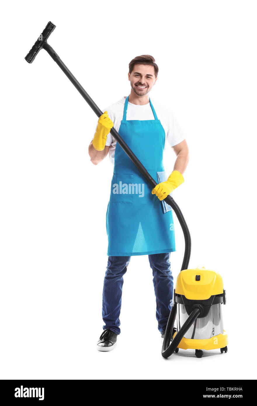 Male janitor with vacuum cleaner on white background Stock Photo - Alamy