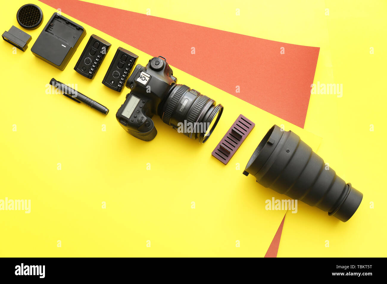 Modern equipment of professional photographer on color background Stock ...