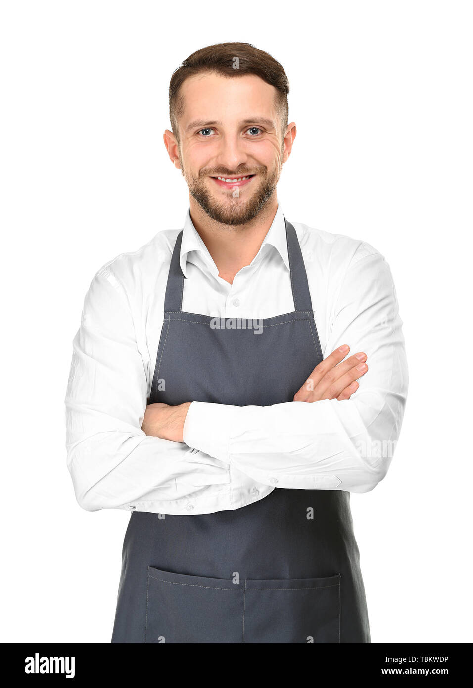 Handsome man gardener in apron hi-res stock photography and images - Alamy