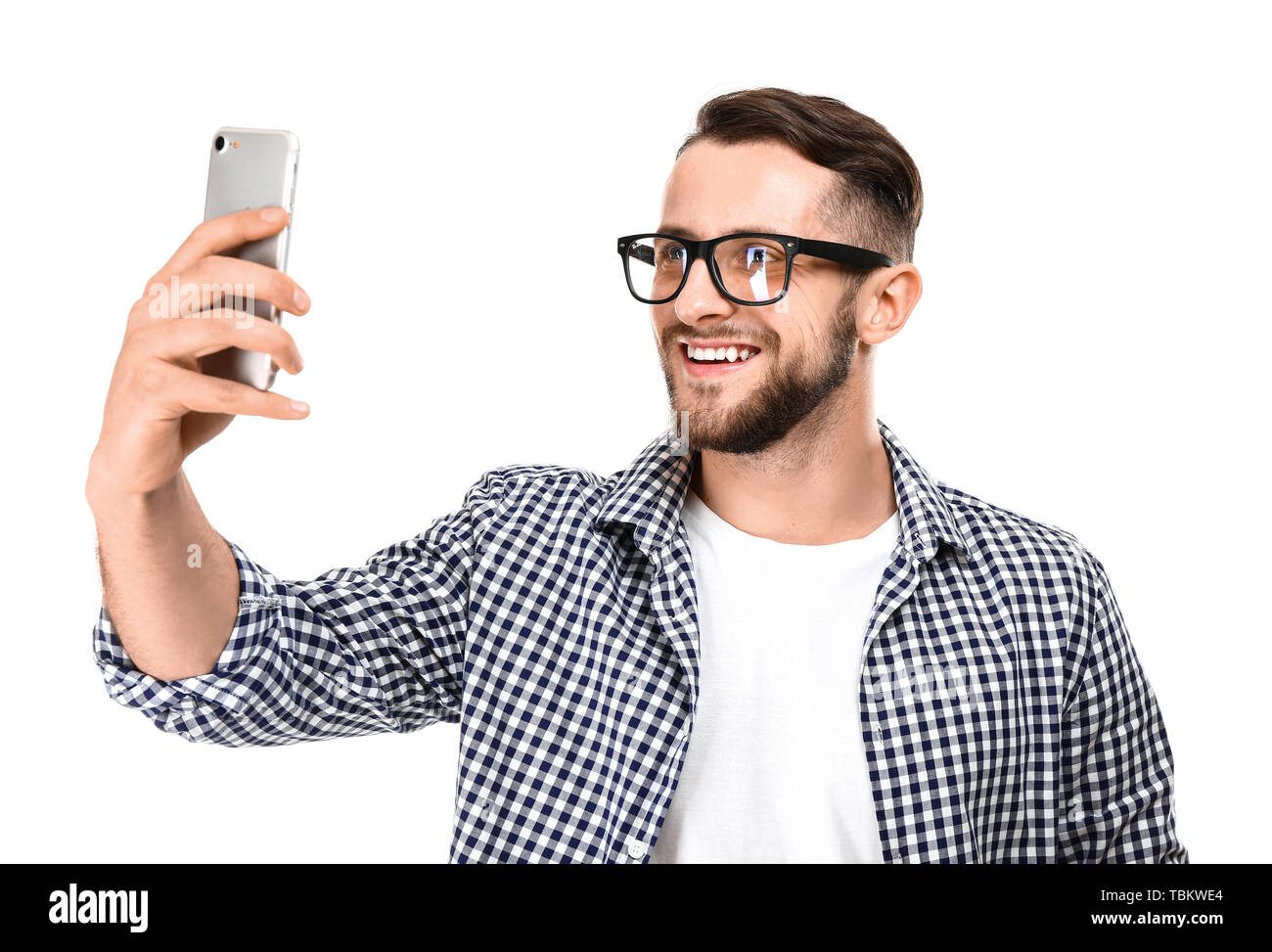 Portrait of handsome man taking selfie on white background Stock Photo - Alamy