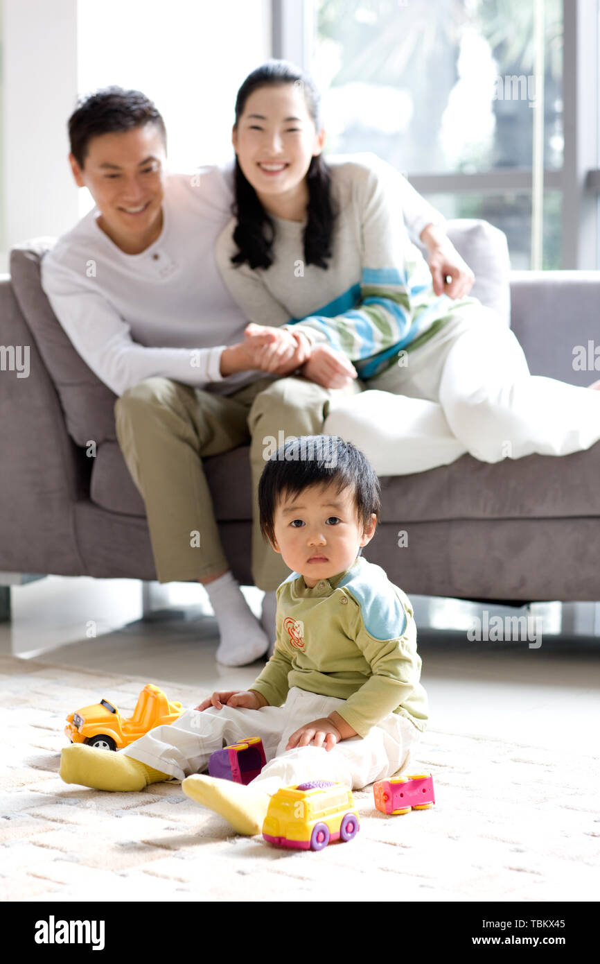 Parents and children play games Stock Photo - Alamy