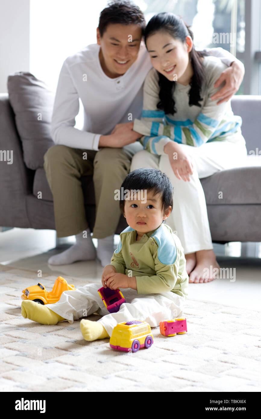 Parents and children play games Stock Photo - Alamy