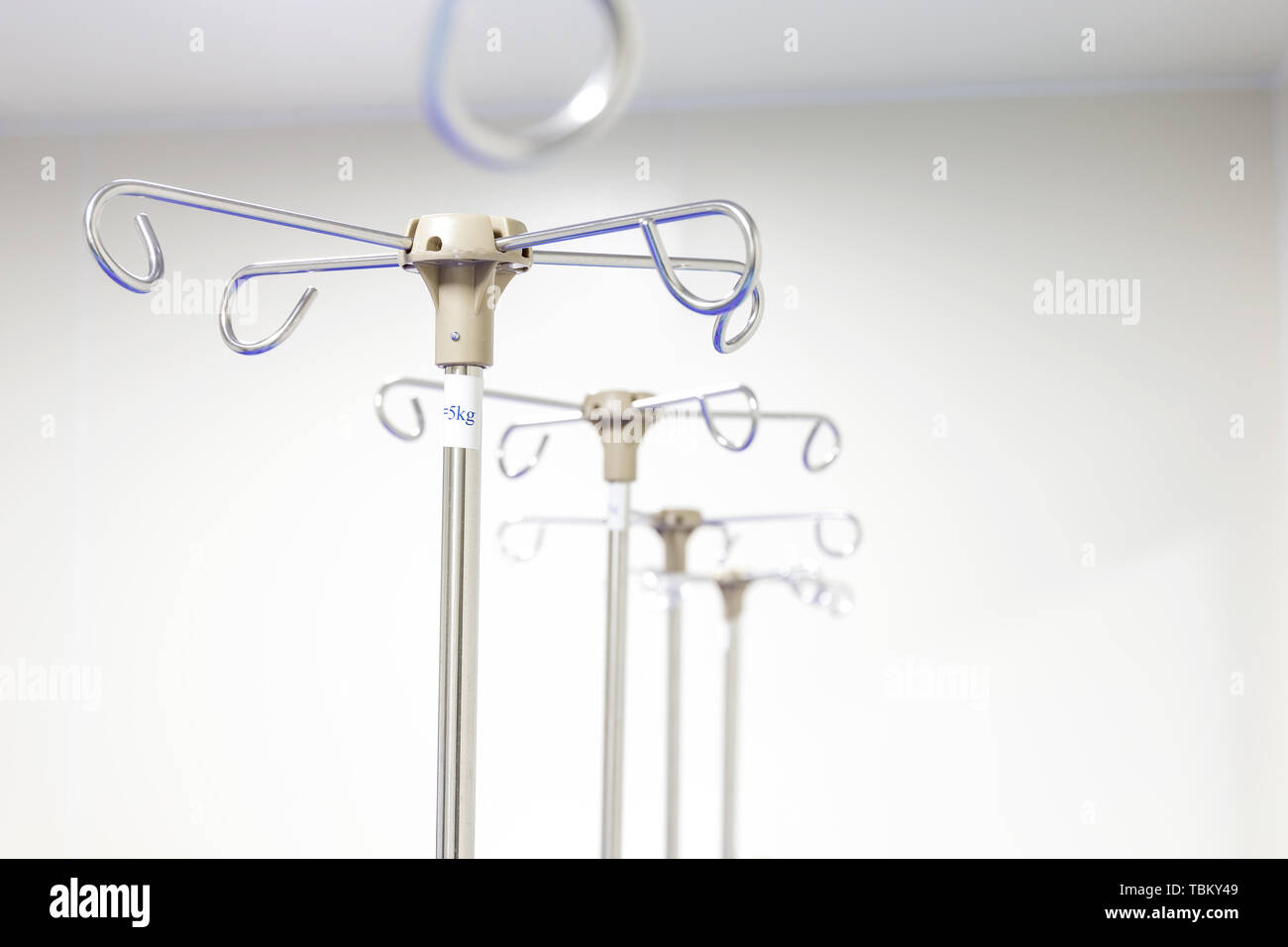 Four hangers hi-res stock photography and images - Alamy