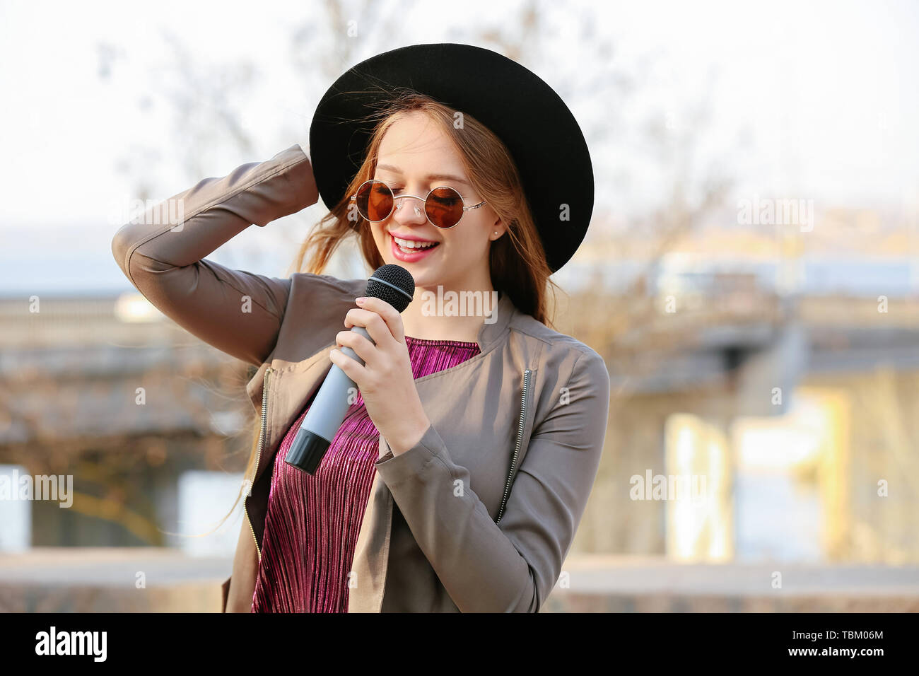 Female Singer With Microphone High Resolution Stock Photography and ...