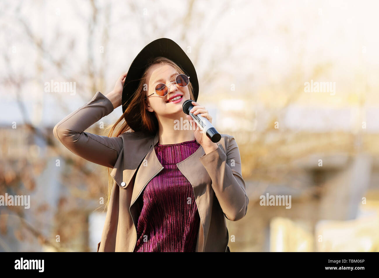 Female Singer With Microphone High Resolution Stock Photography and ...