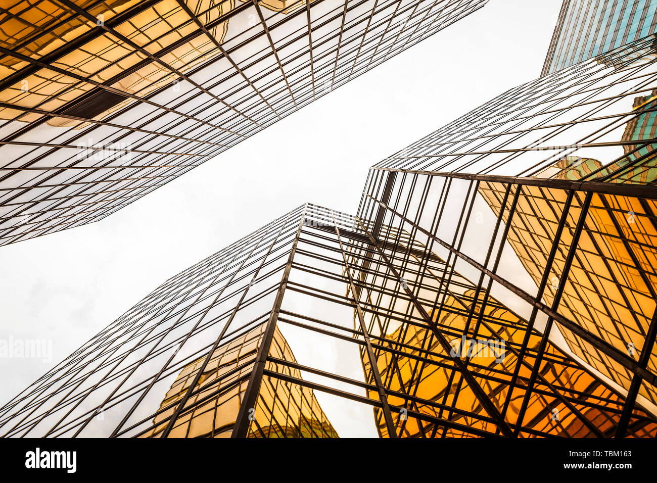 low angle view of modern skyscraper exterior and sky Stock Photo - Alamy
