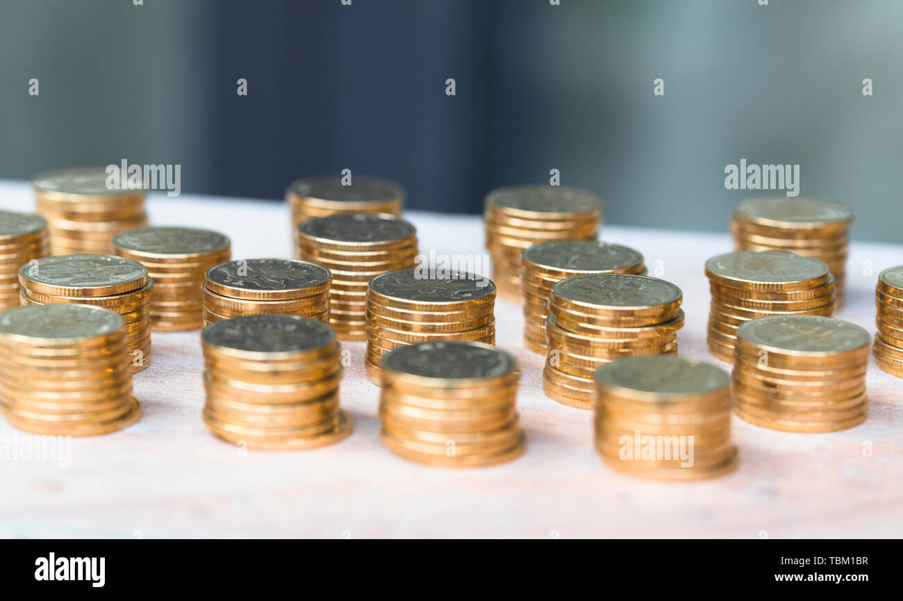 Stacked gold coins Stock Photo - Alamy