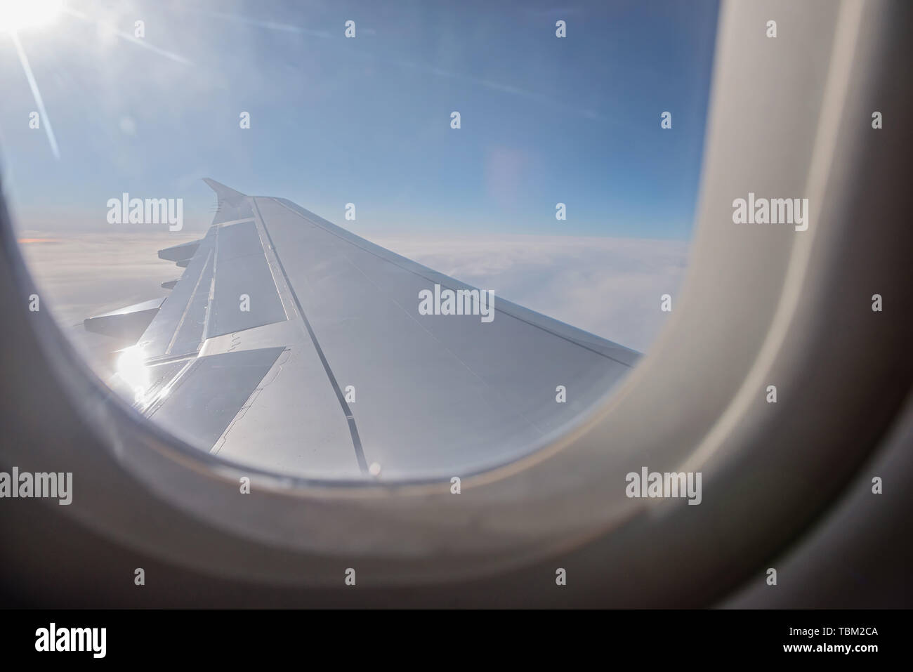 Mountain view from an airplane window Stock Photo - Alamy