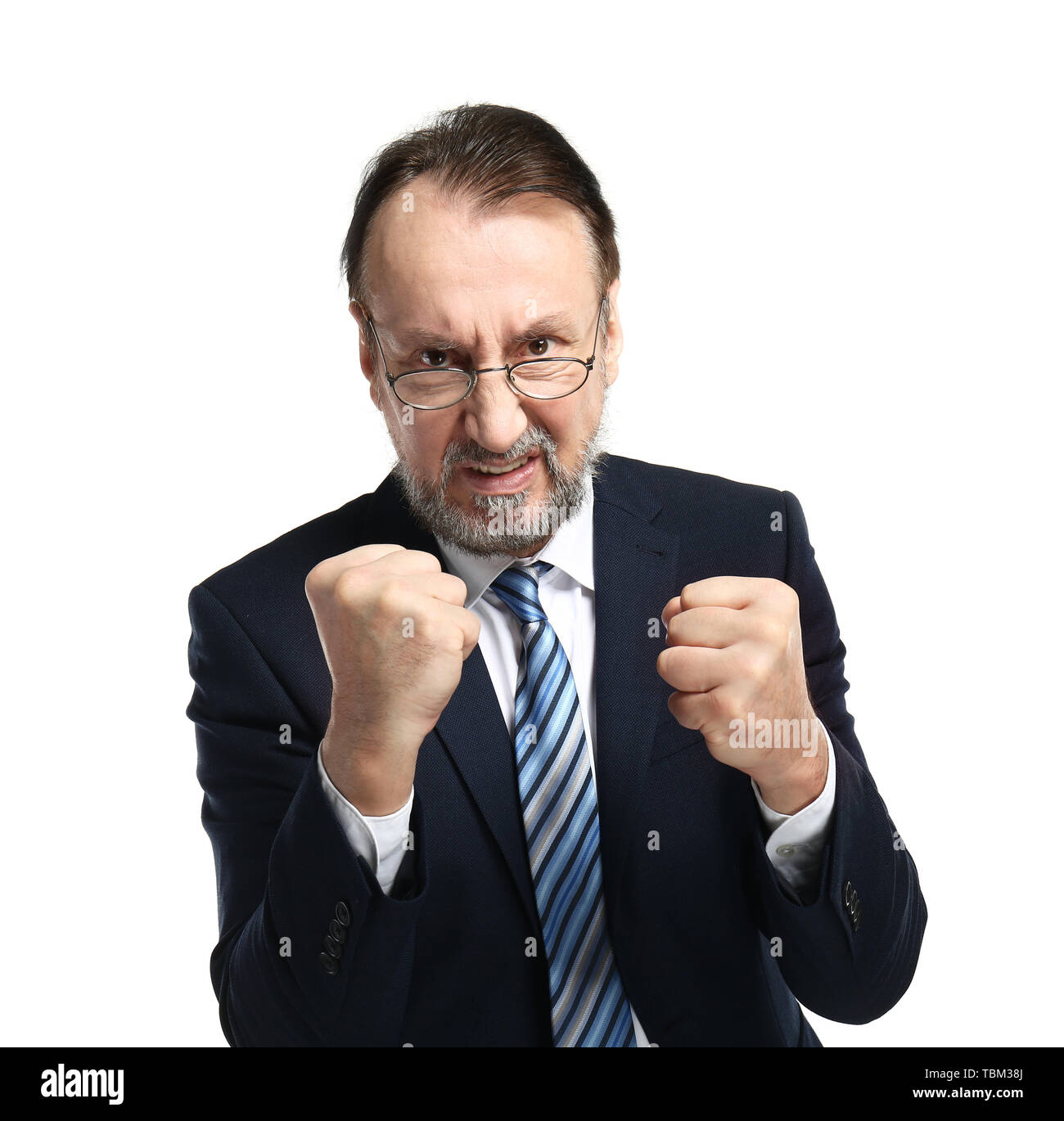 Portrait of angry mature businessman on white background Stock Photo ...