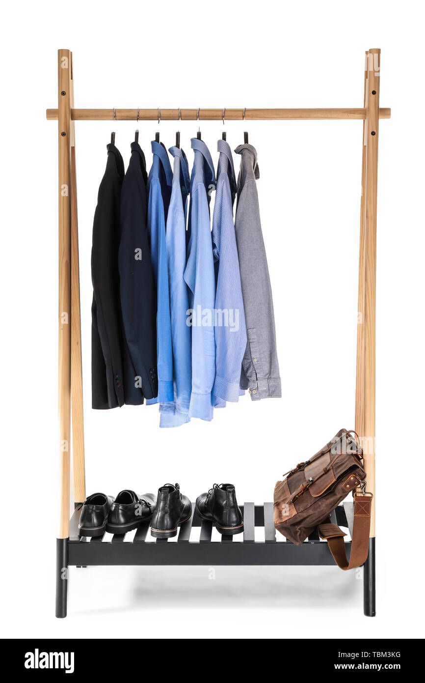 Rack with stylish male clothes on white background Stock Photo - Alamy