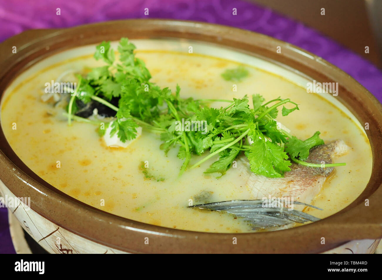 Chinese fish head soup hi-res stock photography and images - Alamy