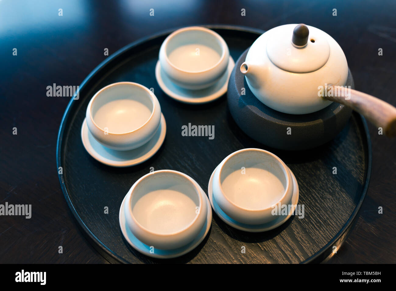 Chinese tea set on plate Stock Photo - Alamy