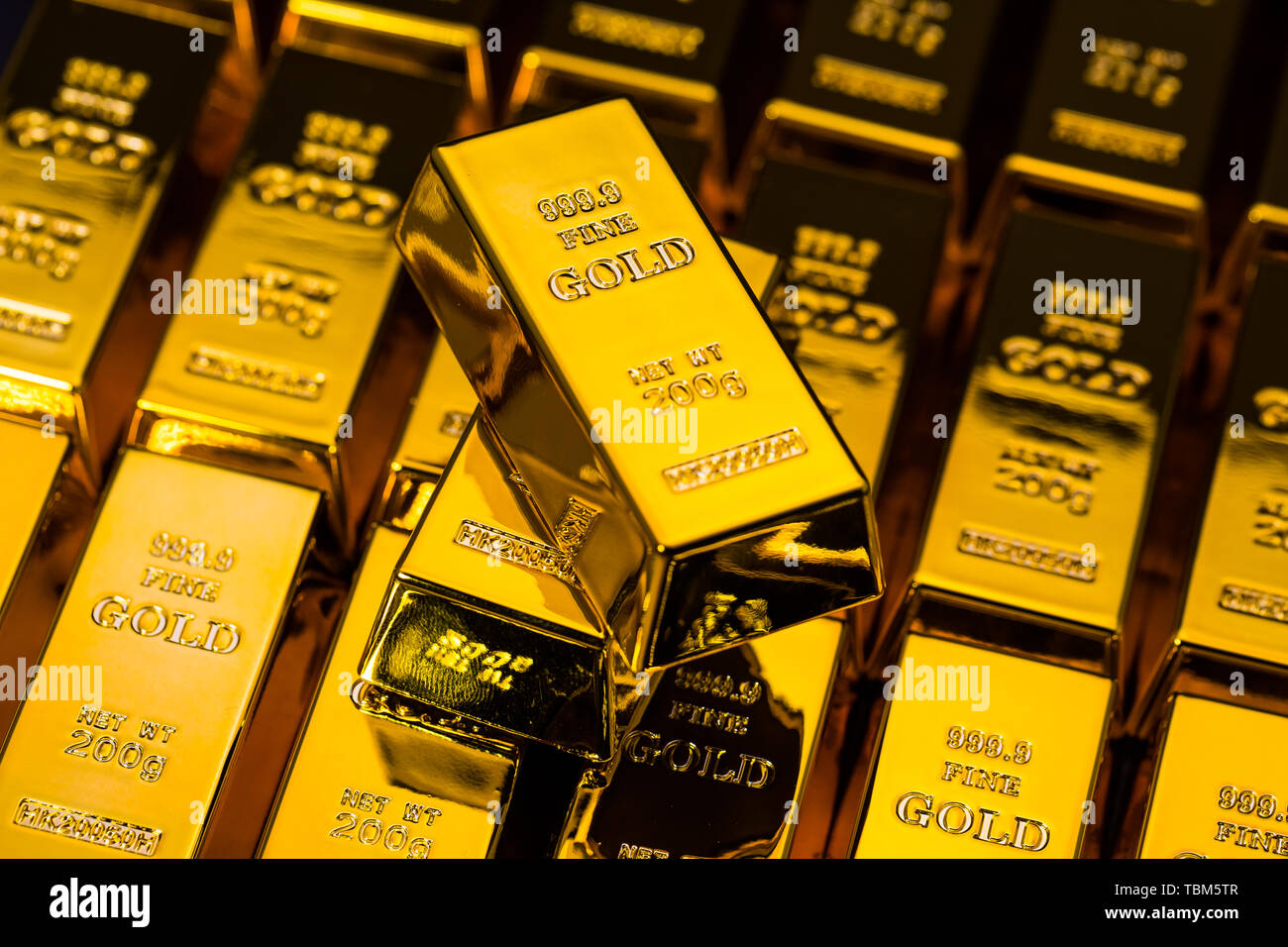 Gold bar wealth management Stock Photo - Alamy