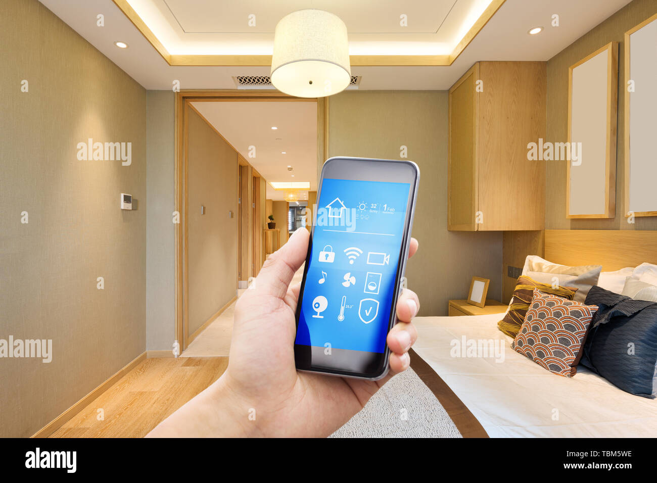 smart phone with smart home with modern bedroom Stock Photo - Alamy