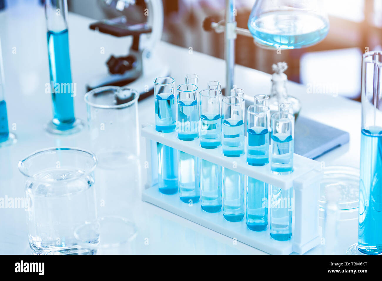 Laboratory test tubes and solution with stethoscope background. Science ...