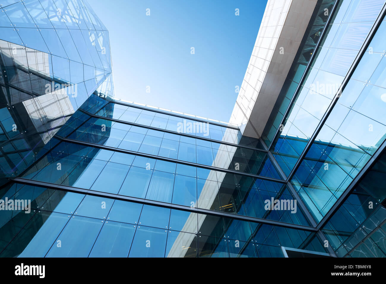Low angle view modern building exterior Stock Photo - Alamy