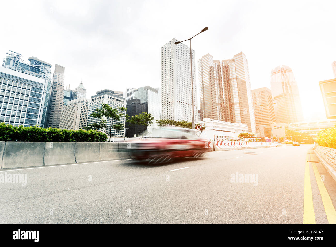 cityscape and traffic trails on the road of modern city Stock Photo - Alamy