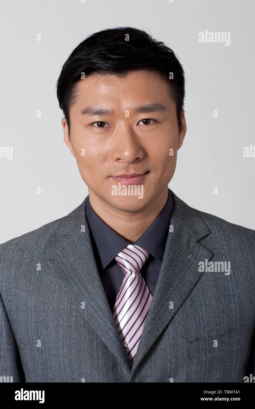 A business portrait of a male white-collar worker Stock Photo - Alamy
