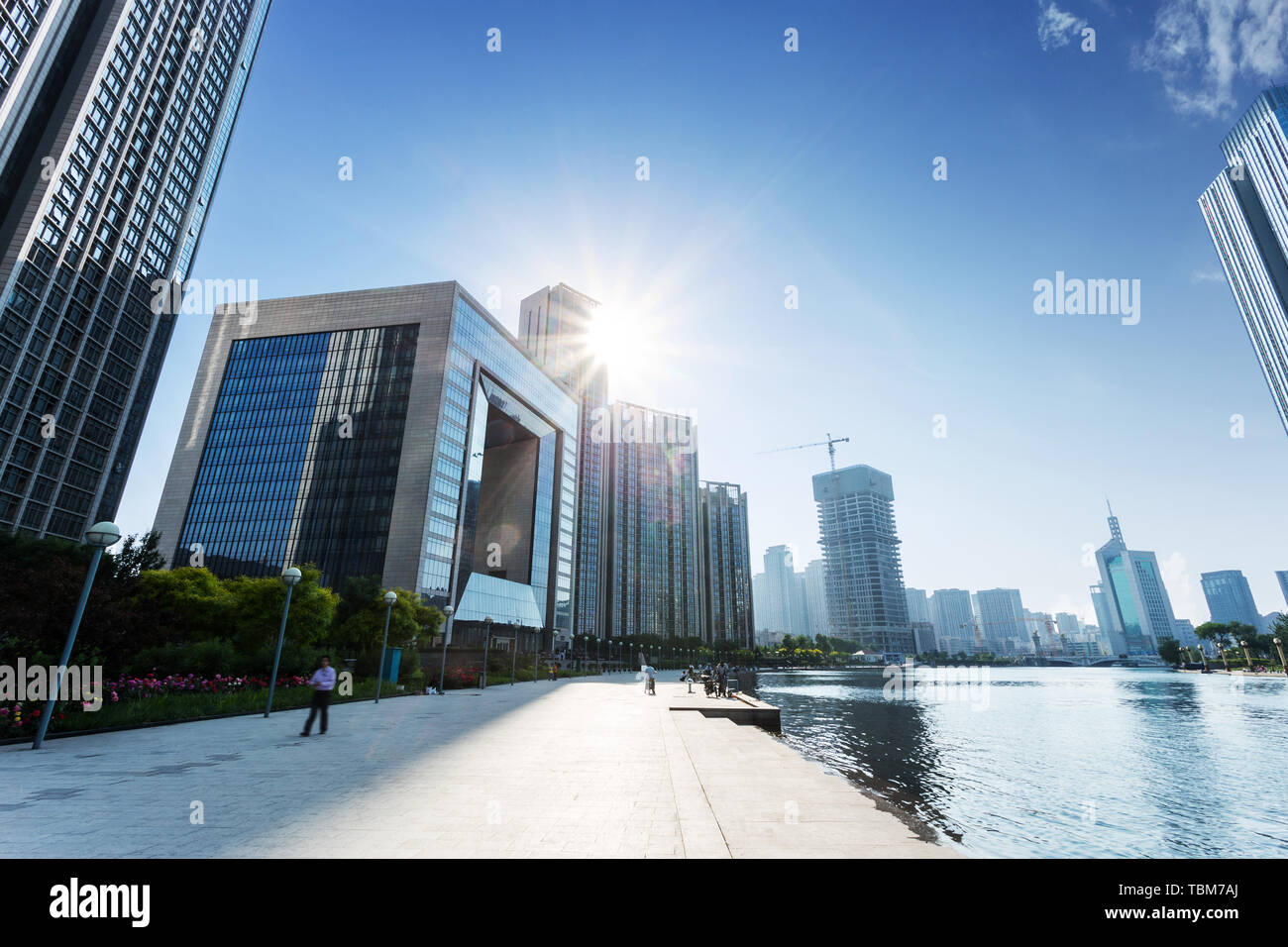modern building exterior with brick road floor at riverbank Stock Photo ...