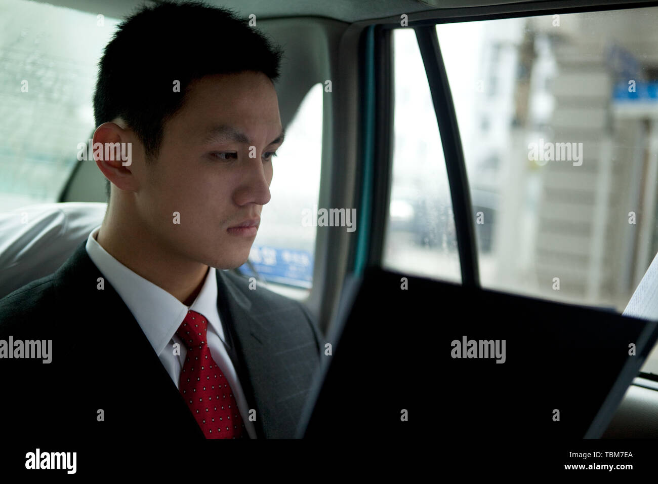 A white-collar man in the car Stock Photo - Alamy