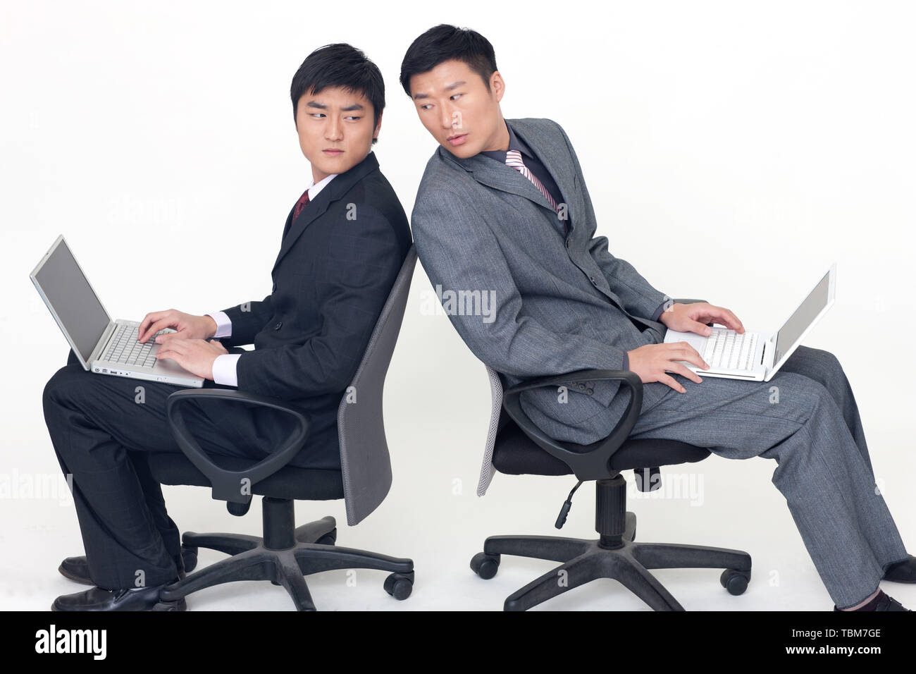 Business people peek into the scene Stock Photo - Alamy