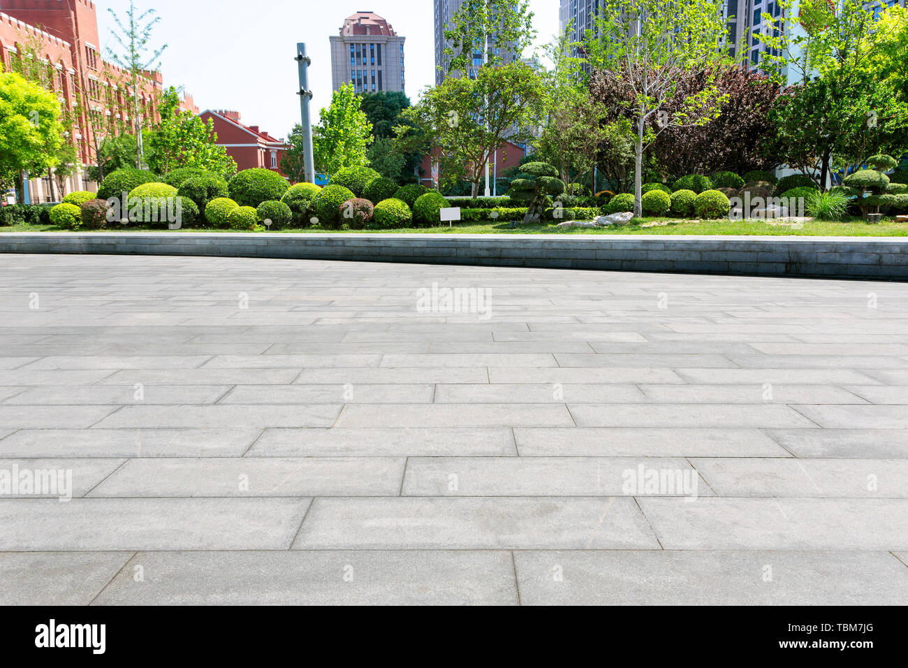 Building and park with empty square floor Stock Photo - Alamy