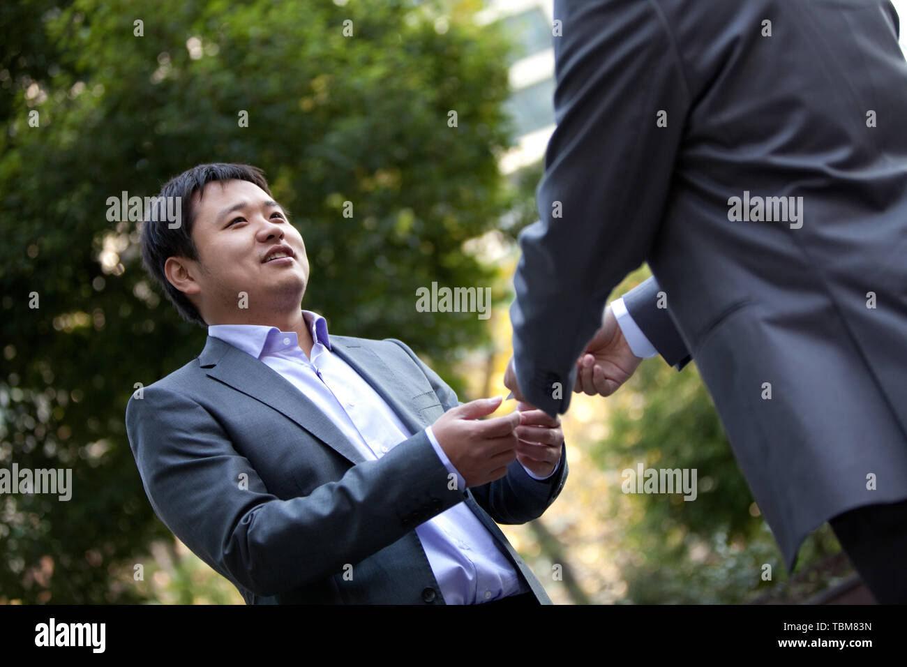 Outdoor scene for two business people Stock Photo - Alamy
