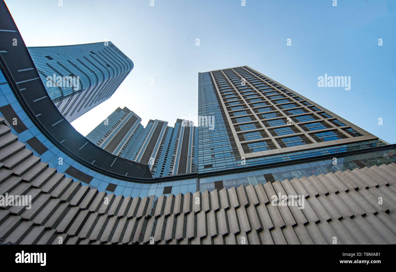 High rise building buildings looking up at blue sky landmark buildings ...