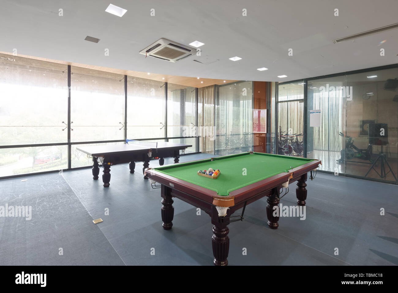 interior of modern recreation room with pools Stock Photo - Alamy