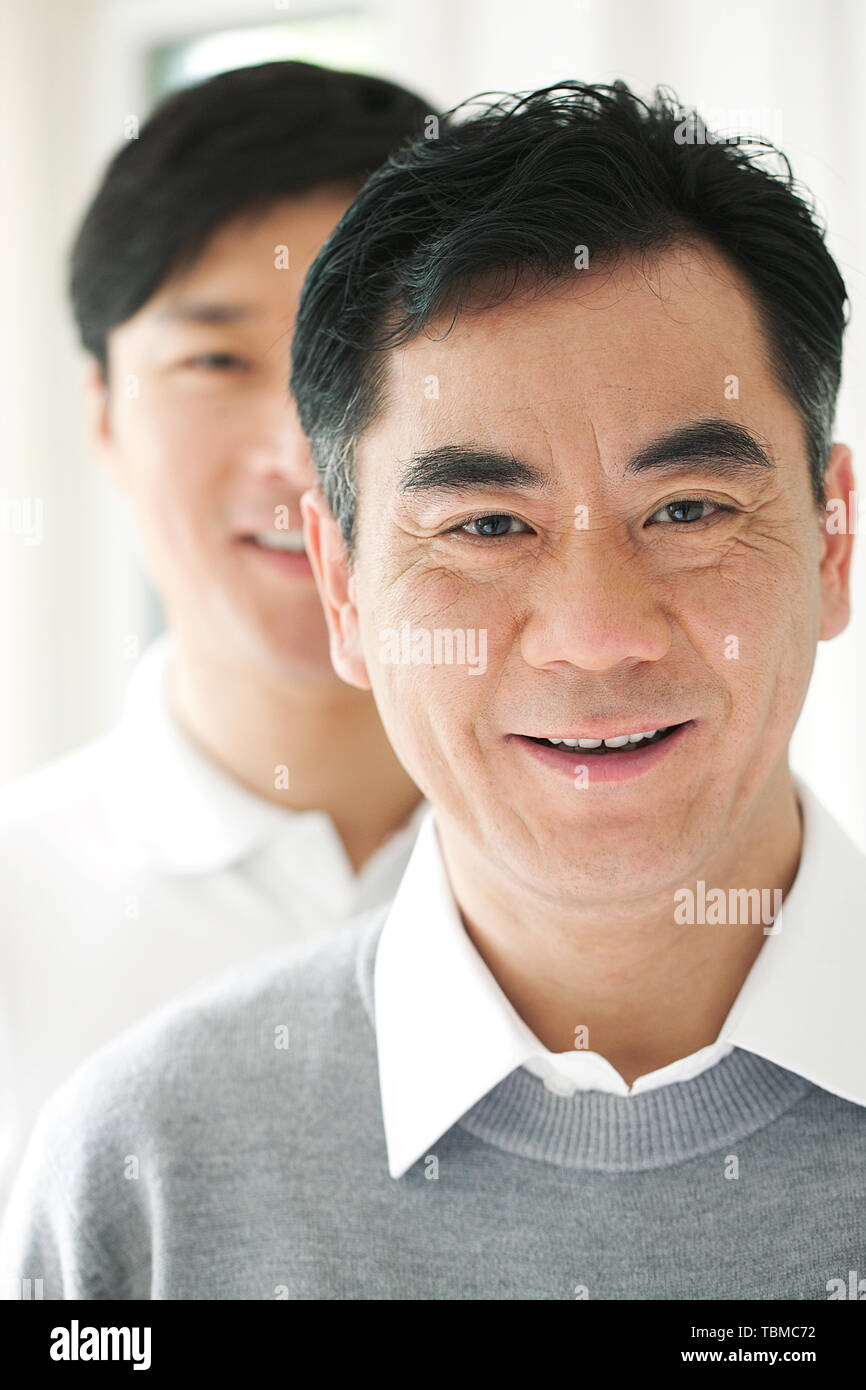 A portrait of a father and son Stock Photo - Alamy
