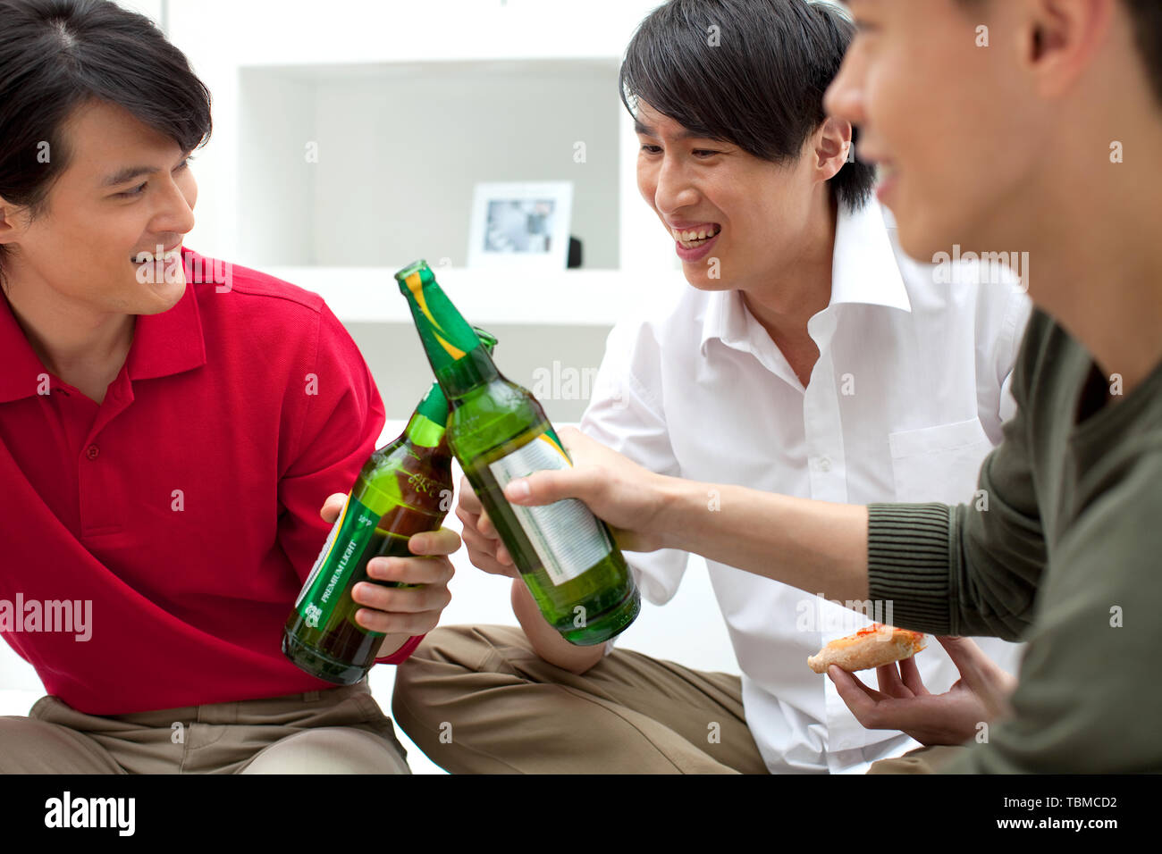 A party of three men Stock Photo - Alamy