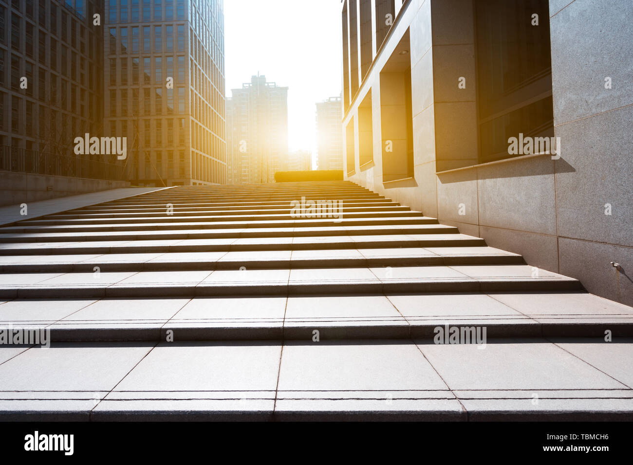 empty footpath between modern building with sunbeam Stock Photo - Alamy