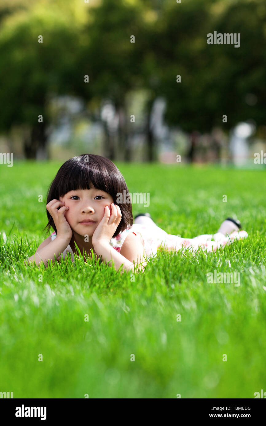 a girl playing outdoors Stock Photo - Alamy