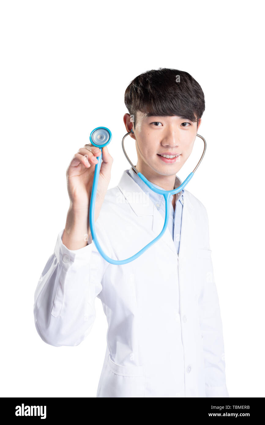 young handsome Asian man doctor working on white background Stock Photo ...